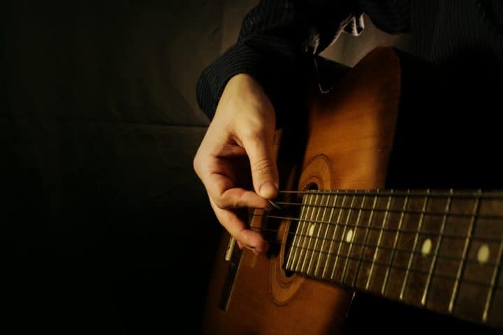 How to Hold a Guitar Pick [Quick, Easy Tips for Beginners] - Music Grotto